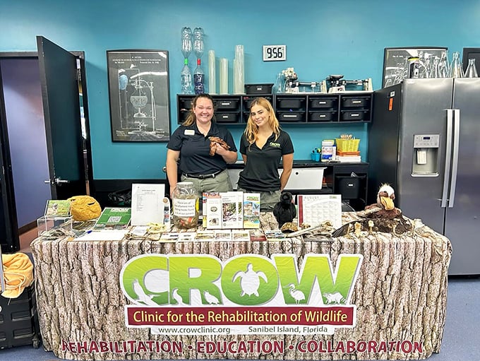 CROW's dedicated staff stands ready at their information booth, where wildlife rehabilitation meets public education with a perfect blend of passion and expertise.