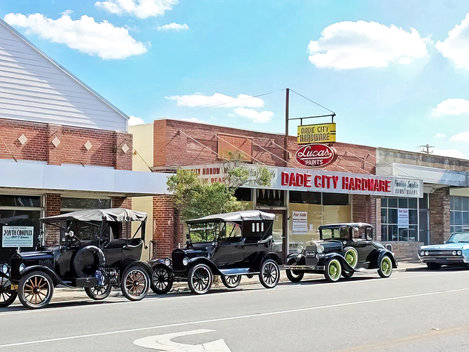 Vintage automobiles line Dade City's historic streets, where hardware stores and brick buildings transport visitors to simpler times.