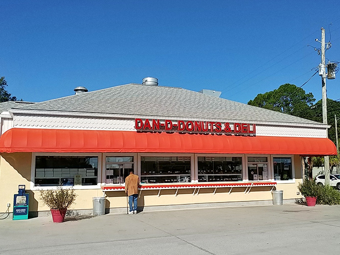 The cheerful yellow building with its bright red awning stands as a beacon of breakfast hope on Harrison Avenue in Panama City.