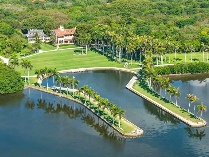 An aerial paradise where royal palms stand at attention and waterways curve like nature's own signature on Miami's coastline.