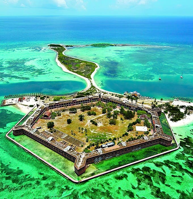 A paradise island fortress surrounded by waters so blue they make the Caribbean jealous &ndash; Dry Tortugas floats like a dream 70 miles from civilization.