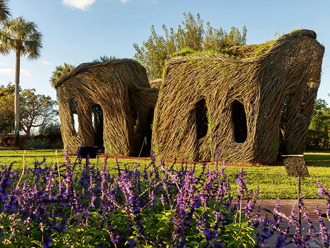 That stickwork structure looks like a cathedral designed by birds with architecture degrees, and honestly, they nailed it.