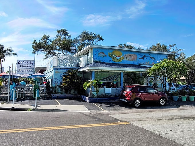 The iconic blue exterior of Dockside Dave's beckons seafood lovers with its cheerful marine murals and promise of fresh-caught delights.