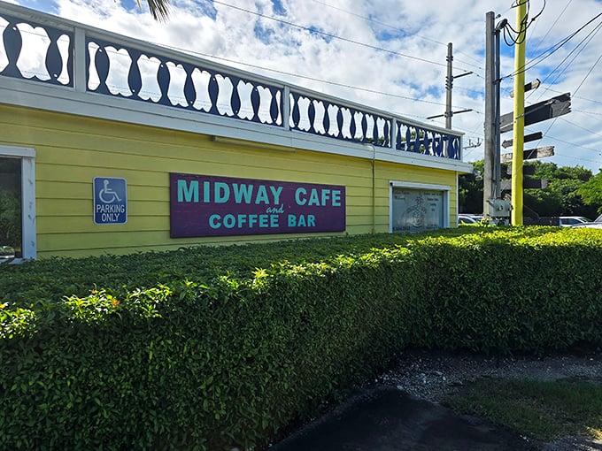 Sunshine-yellow with a splash of tropical charm, Midway Cafe's exterior is like a cheerful "HELLO!" in building form.