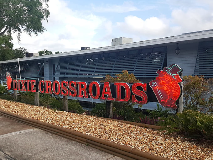 The iconic Dixie Crossroads sign welcomes seafood lovers with its dancing red shrimp mascot &ndash; a beacon of deliciousness on Florida's Space Coast.