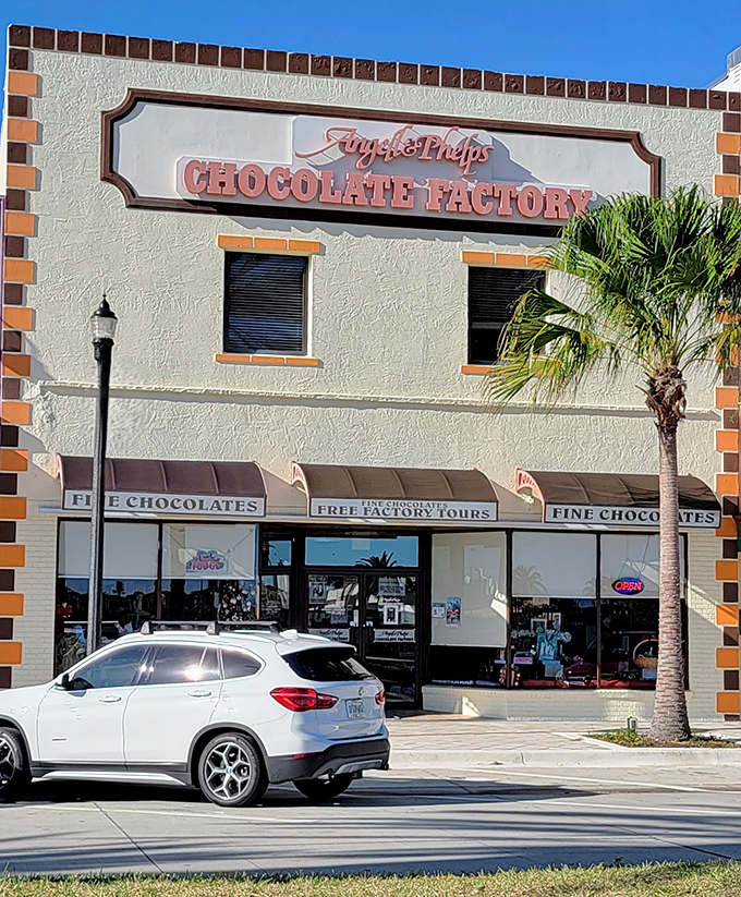 Exterior: The cream-colored façade with distinctive orange trim beckons chocolate lovers like a sweet siren call to paradise.