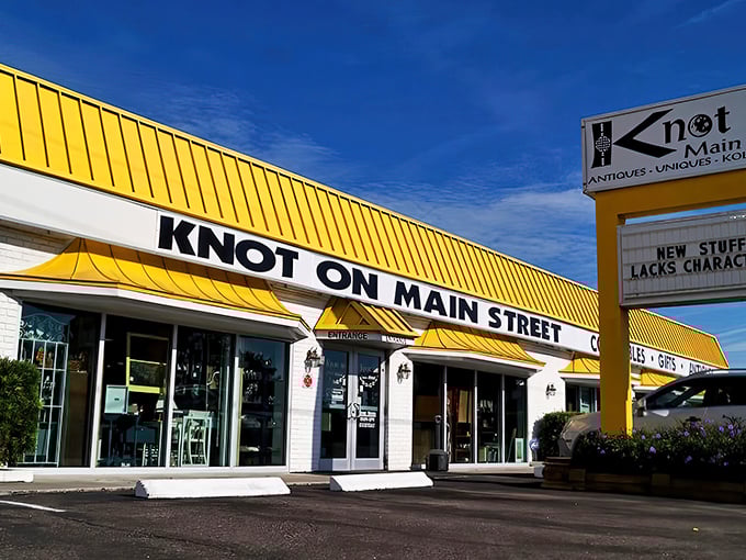 The sunshine-yellow awning of Knot On Main Street stands like a beacon for treasure hunters, promising adventures in antiquing just beyond those doors.