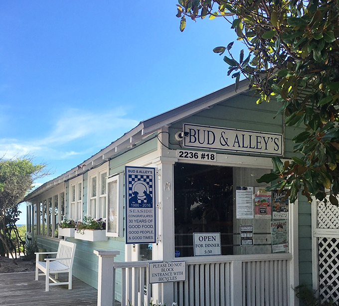 Exterior: A mint-green coastal haven beckoning seafood lovers with its promise of "Good Food, Good People, Good Times" &ndash; Florida dining perfection.