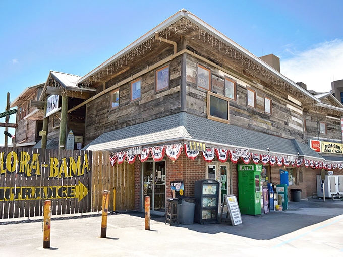 The weathered wooden exterior of Flora-Bama stands proudly on the state line, a beacon for oyster lovers and music enthusiasts alike.