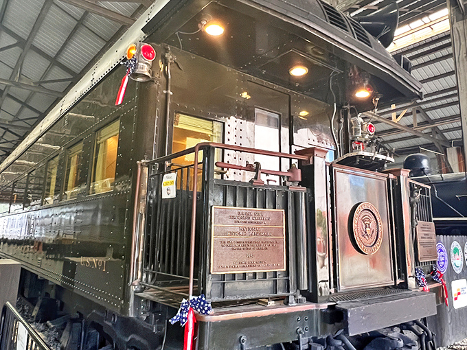 The Ferdinand Magellan stands regally at Gold Coast Railroad Museum, its olive-green exterior hiding presidential secrets within those armored walls.