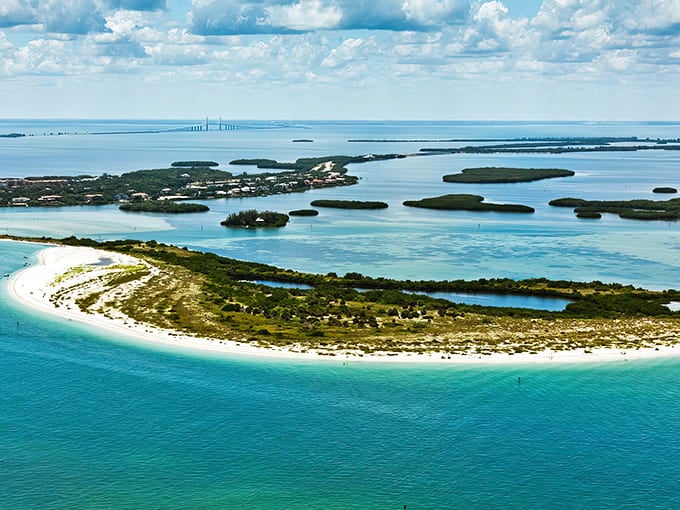 An aerial paradise of turquoise waters and pristine beaches, Fort De Soto Park sprawls across five interconnected islands like Florida's best-kept open secret.
