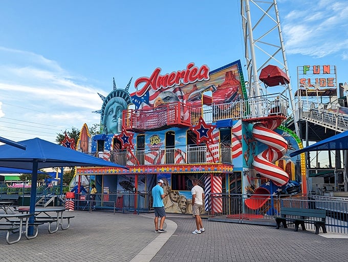 The Americana-themed entrance welcomes visitors with patriotic flair and a replica Statue of Liberty. Norman Rockwell would feel right at home in this red, white, and blue wonderland.
