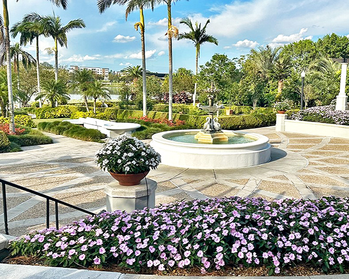 A serene oasis where palm trees stand sentinel over manicured gardens and a circular fountain &ndash; Florida's version of paradise found.