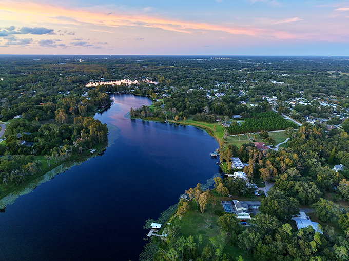 Lutz: Sunset paints the sky in watercolor hues over Lutz's tranquil waters, where time seems to slow just for the view.