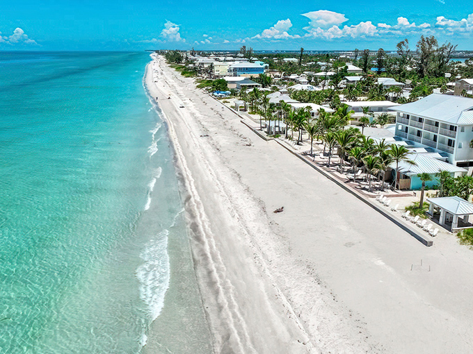 Manasota Key's pristine coastline stretches for 11 glorious miles, where turquoise waters meet powdery white sand in perfect harmony.