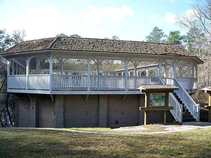 The historic White Sulfur Springs bathhouse stands as a ghostly reminder of Florida's spa-tourism heyday, its weathered structure still proudly overlooking the Suwannee River.