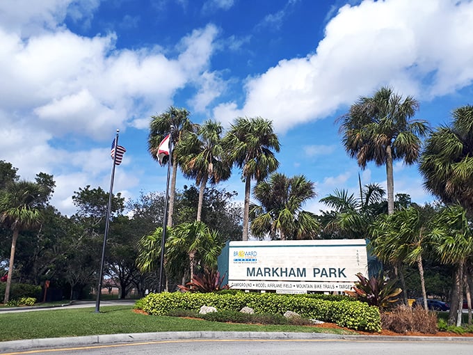 Welcome to paradise! Markham Park's entrance beckons with swaying palms and Florida sunshine, promising adventures beyond the ordinary.
