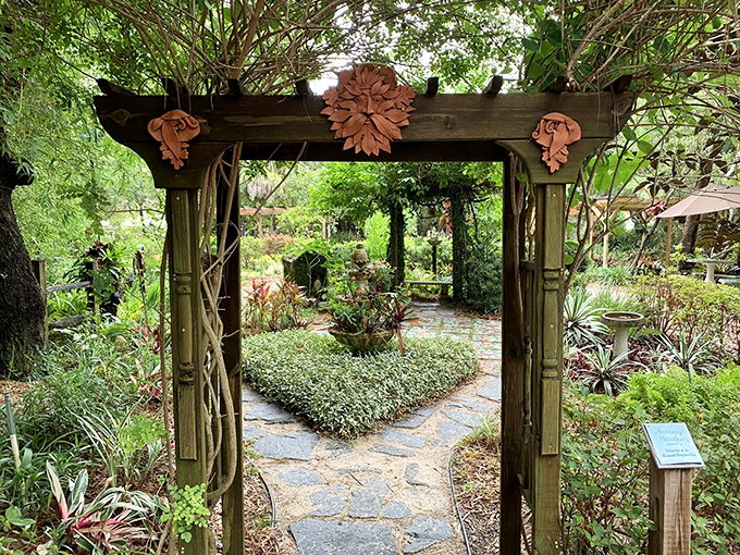 A wooden archway beckons visitors into a world of botanical wonders, nature's version of "you had me at hello."