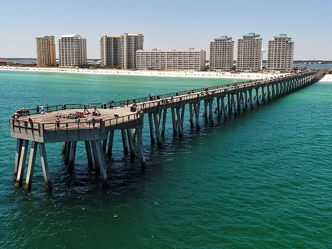 Stretching 1,545 feet into emerald waters, Navarre Beach Pier stands as Florida's longest wooden invitation to paradise.