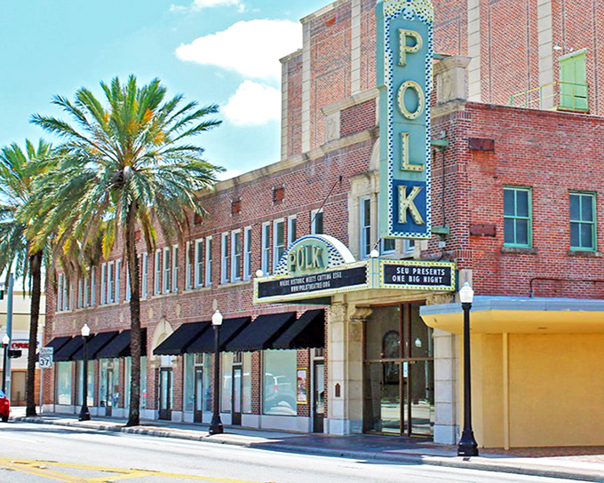 The iconic Polk Theatre marquee stands proud in downtown Lakeland, a beacon of vintage entertainment that's been drawing crowds since 1928.
