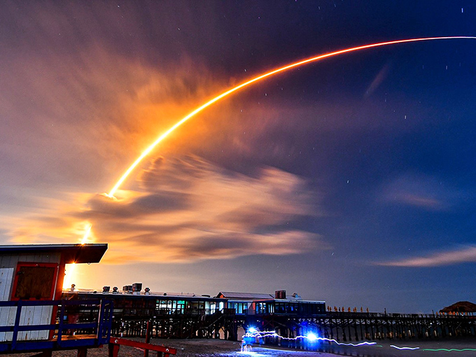 Rikki Tiki Tavern: Where else can you watch a rocket's fiery arc illuminate the night sky while sipping tropical drinks on a wooden pier?