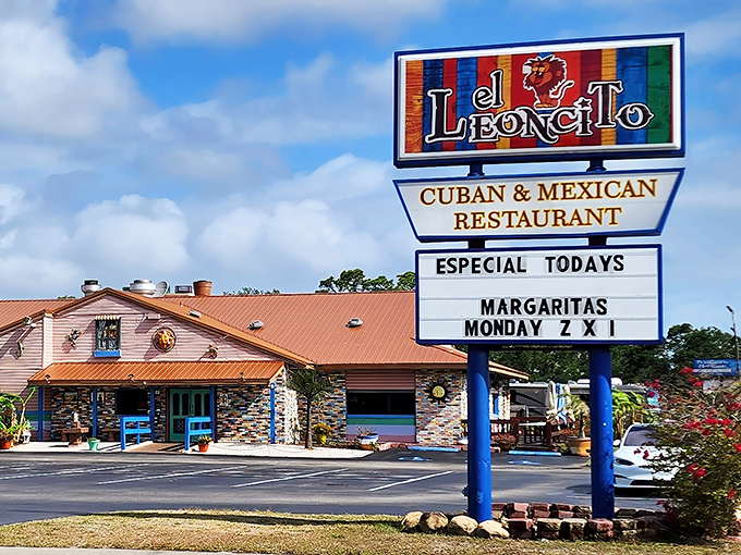El Leoncito's colorful roadside sign promises Cuban-Mexican delights, while the stone facade hints at the warm welcome awaiting inside.