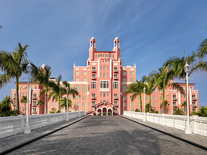 The majestic pink fa&ccedil;ade of The Don CeSar rises like a confection against the Florida sky, beckoning travelers with promises of luxury and nostalgia.