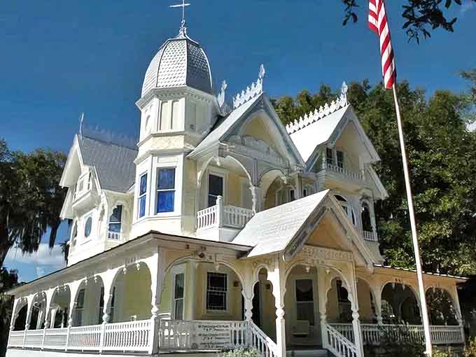 The Donnelly House: A butter-yellow Victorian beauty with white gingerbread trim that's equal parts enchanting and eerie – Florida's haunted wedding cake.