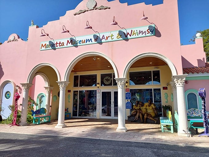 The Marietta Museum of Art & Whimsy welcomes visitors with its unmistakable pink fa&ccedil;ade, standing like a jubilant exclamation point against the Florida sky.