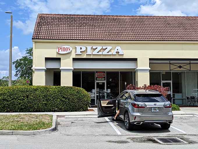 The unassuming exterior of Pino's Pizzeria hides some of Bonita Springs' best pizza, like Clark Kent hiding Superman.