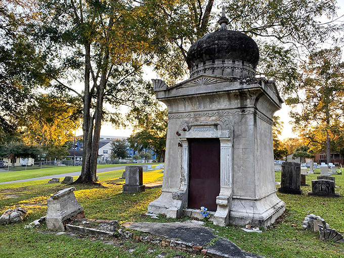 The Phillips Mausoleum stands like an architectural time traveler among the gravestones, its dome reaching skyward as if trying to touch the heavens themselves.