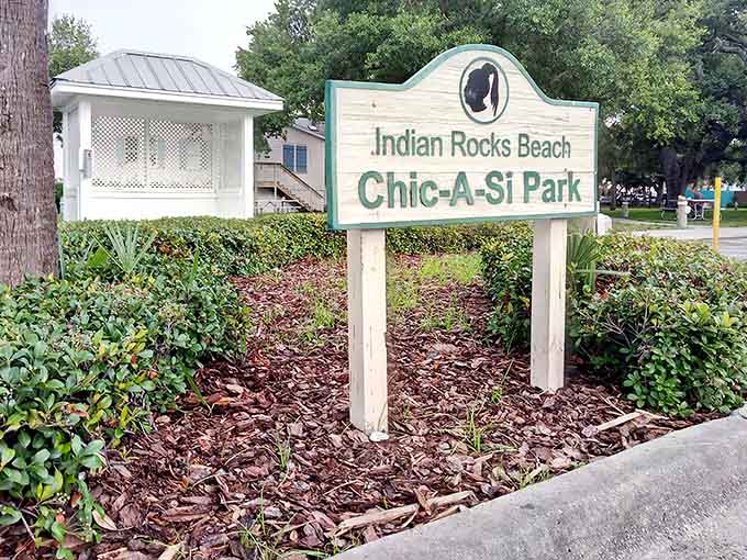 The welcoming sign at Chief Chic-A-Si Park promises exactly what it delivers: a peaceful waterfront retreat where history and nature shake hands.