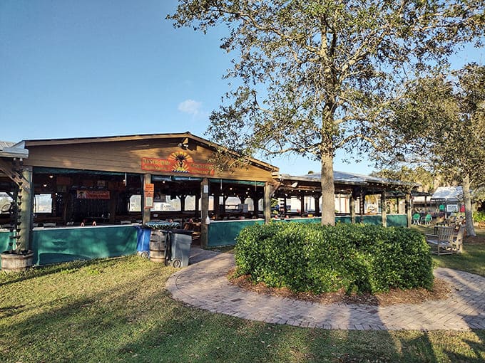 The welcoming exterior of Summer Crush beckons like an oasis of good times, where palm trees and grapevines coexist in perfect Florida harmony.