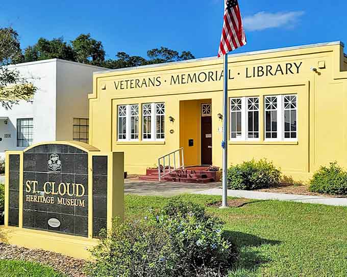 That cheerful yellow facade isn't just pretty; it's been welcoming history lovers since this building opened as a library in 1922.