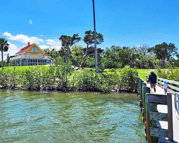 That cheerful yellow house perched by the lagoon isn't just photogenic, it's your gateway to centuries of stories waiting to be discovered.