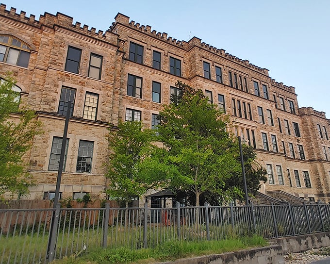 The imposing stone facade of the former Sacred Heart Hospital now houses some of Pensacola's most spirited pizza gatherings.