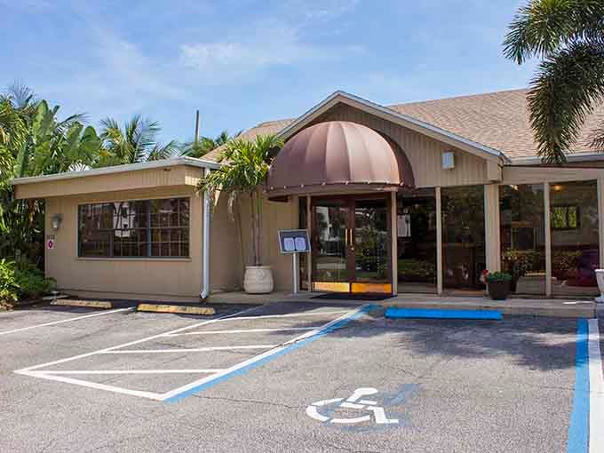 That copper awning and those palm trees mean you've arrived at Italian paradise in Vero Beach, Florida style.