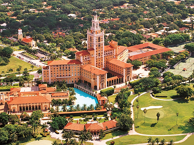 The Biltmore's majestic exterior rises like a Mediterranean dream against Florida's blue sky &ndash; architectural swagger that screams "I'm kind of a big deal."