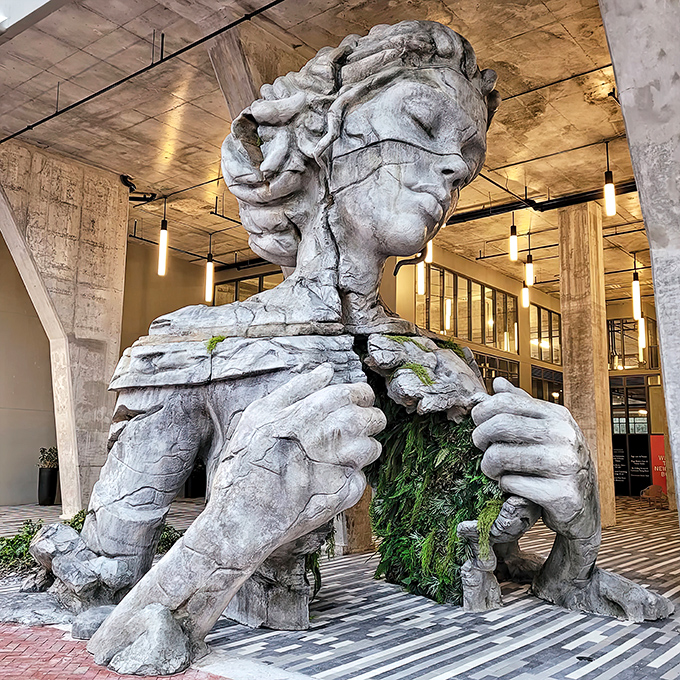Thrive stands as a silent sentinel in downtown Miami, its massive stone presence commanding attention from passersby and creating an unexpected moment of wonder.