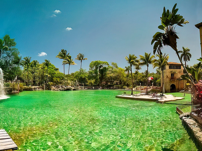 The Venetian Pool shimmers like a jewel in Coral Gables, its emerald waters inviting visitors to escape the ordinary and dive into history.