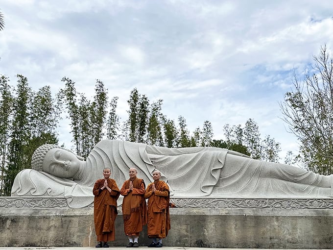 The White Sands Buddhist Center welcomes visitors with serene grounds and spiritual statues, a peaceful oasis in bustling Florida.