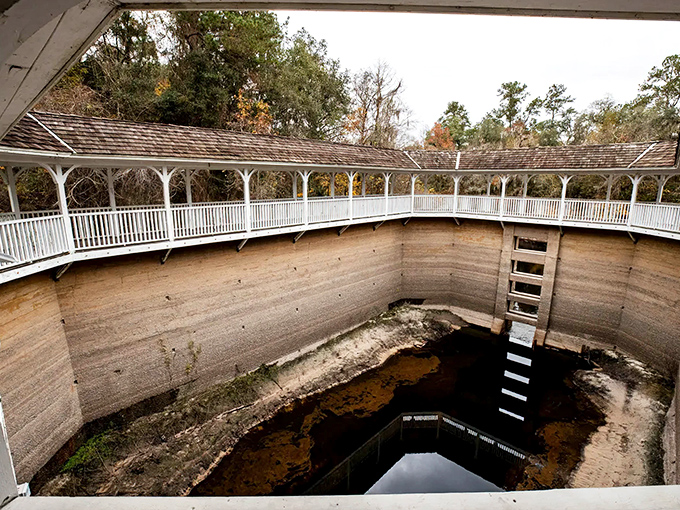 The historic White Sulfur Springs bathhouse stands like a ghostly sentinel, its weathered walls whispering tales of Victorian-era health seekers.