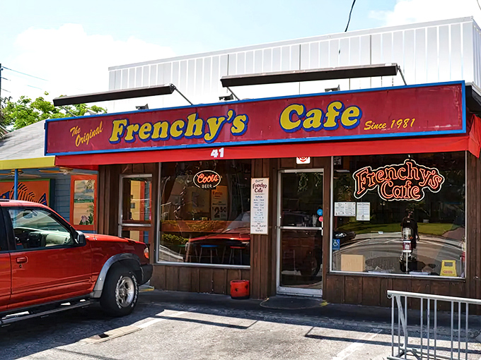The iconic red awning of Frenchy's Cafe stands as a beacon for seafood lovers, promising grouper greatness within these humble walls.