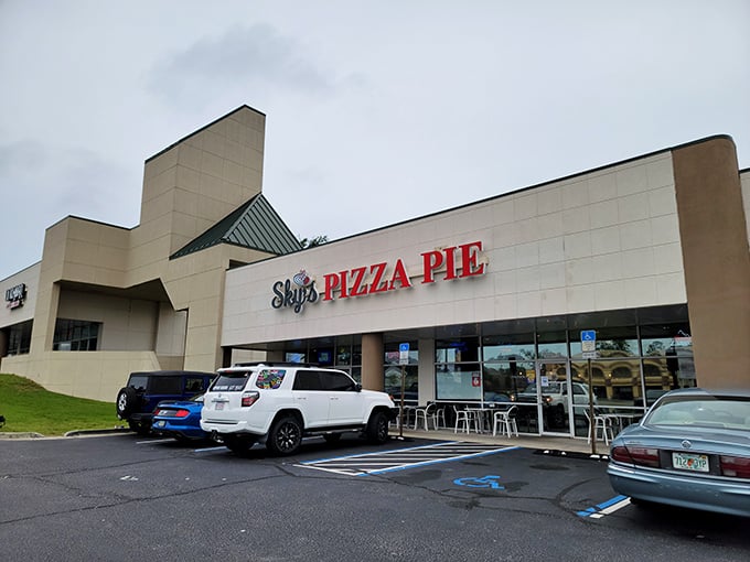 Sky's Pizza Pie's unassuming exterior hides a world of authentic New York-style pizza treasures waiting to be discovered inside.