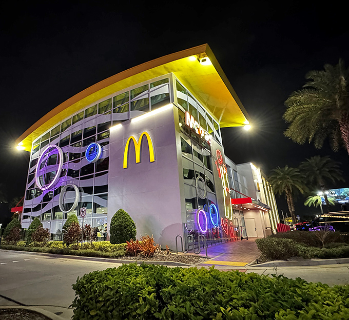 Not your average Mickey D's! This glowing architectural marvel looks like the mothership of fast food has landed in Orlando.