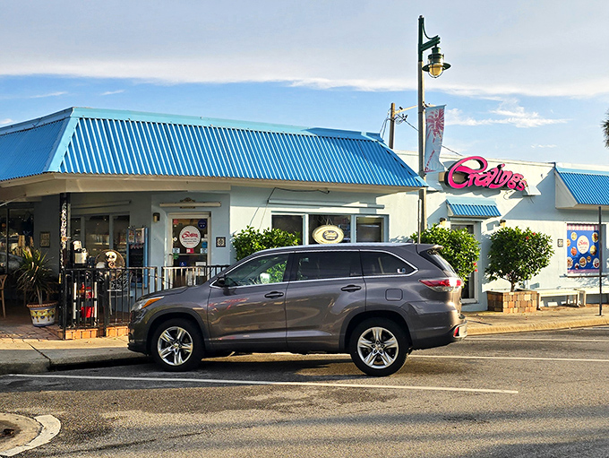 The cheerful blue-roofed storefront beckons like a culinary lighthouse, promising delicious refuge from ordinary sandwich experiences.