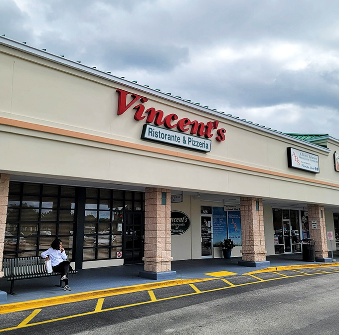 Vincent's welcoming storefront beckons hungry patrons with its bold red signage &ndash; a strip mall treasure hiding authentic Italian delights within.