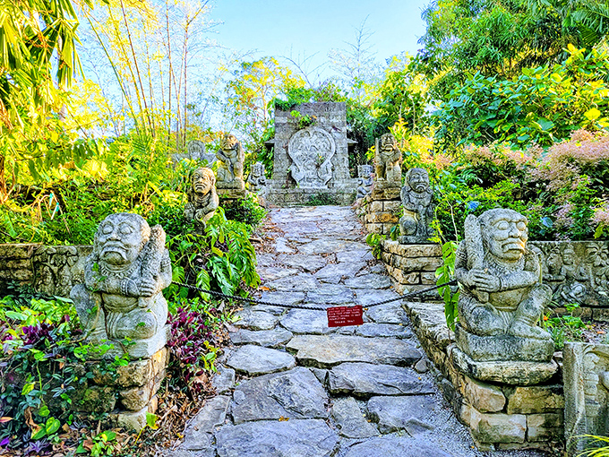 Ancient stone guardians stand watch over a path that seems to lead straight into another time and place.