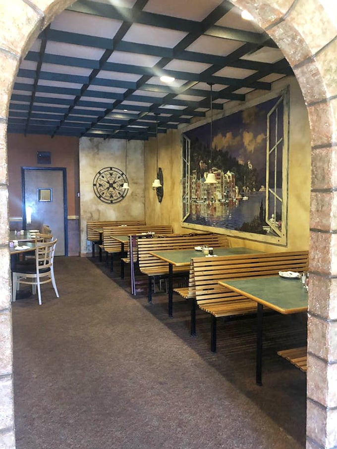 Archways frame dining nooks like scenes from an Italian countryside villa &ndash; creating intimate spaces for conversation and connection over exceptional food.