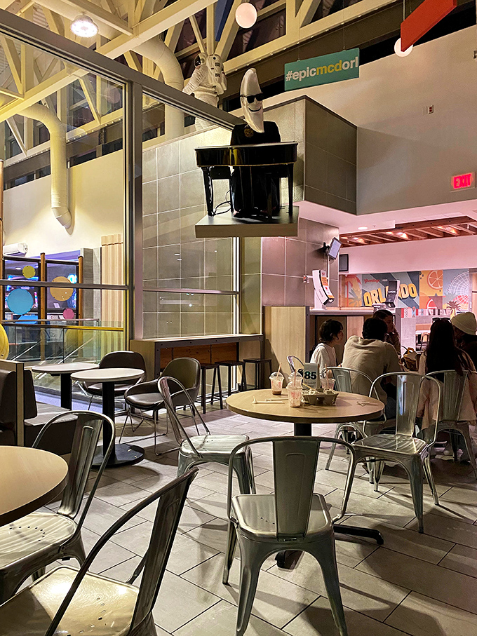 Banana sculptures watching over diners like potassium-rich guardian angels. Fast food meets modern art installation.